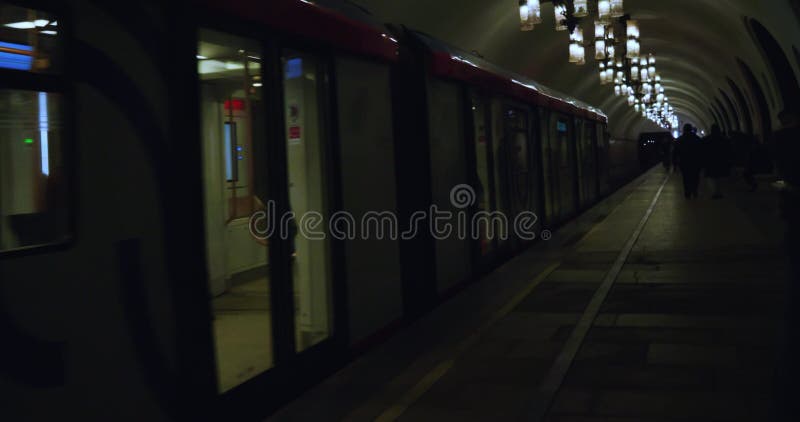 Passengers Waiting for Trains on the Underground Platform in the Subway ...