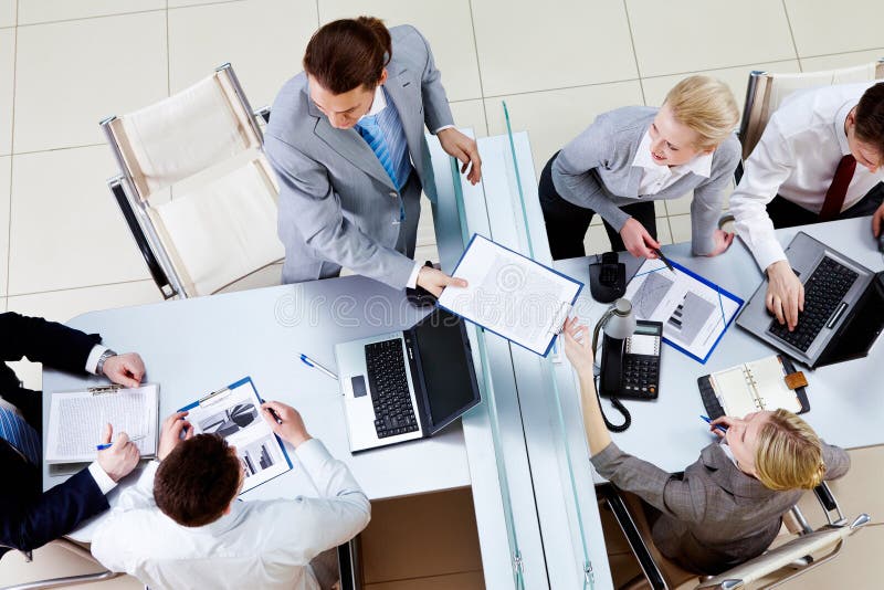 Passing document stock image. Image of businesspeople - 16884675