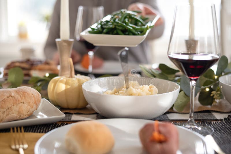 Passing Food Across the Table at a Holiday Meal Stock Photo - Image of ...