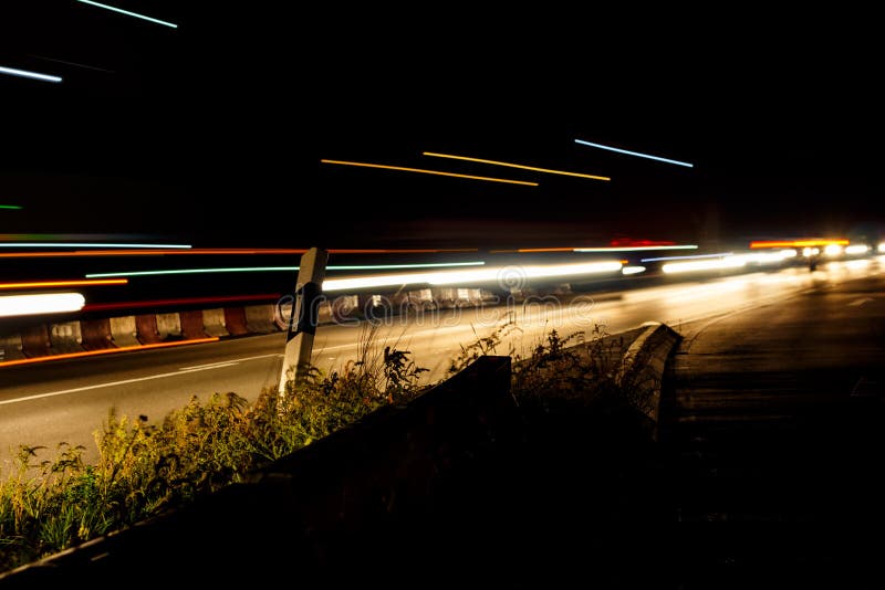 The Passing Lights of Cars and Trucks at Night Stock Image - Image of ...