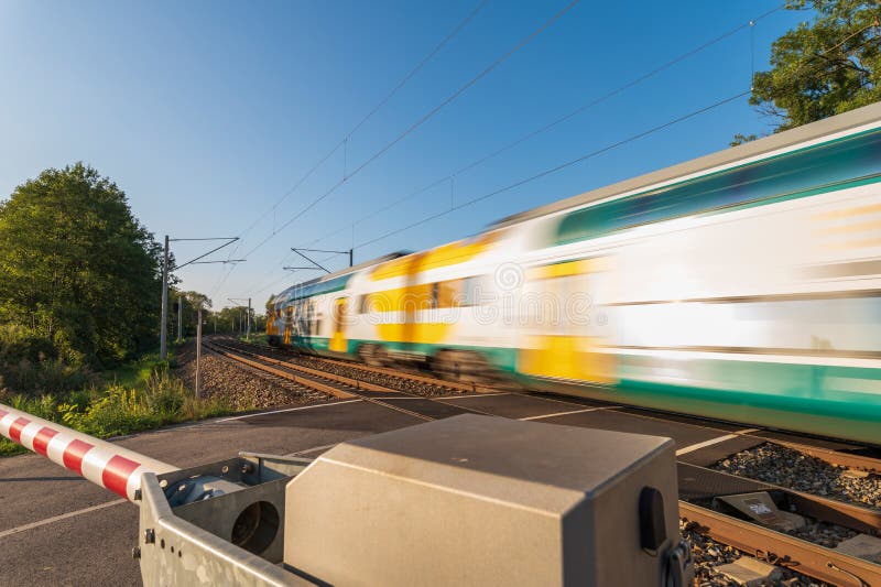 Passing of a Modern Double-decker Train Stock Photo - Image of barrier ...
