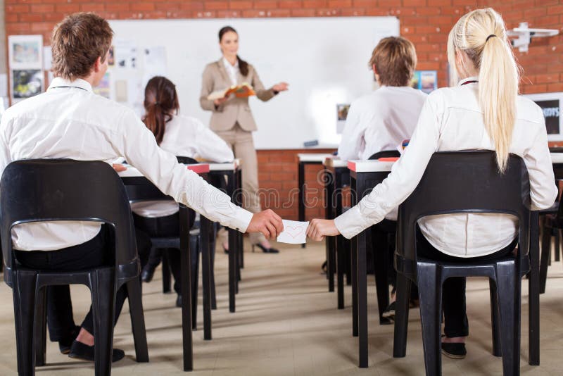 Passing note in classroom stock image. Image of beautiful - 27208275
