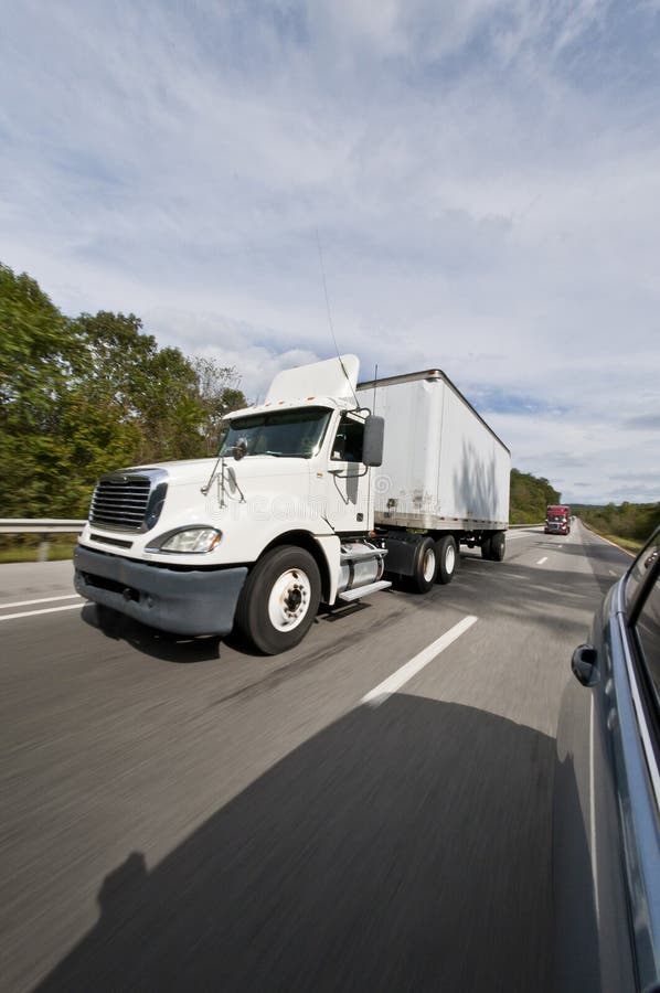 Passing 18-Wheelers on the Interstate Stock Photo - Image of front ...