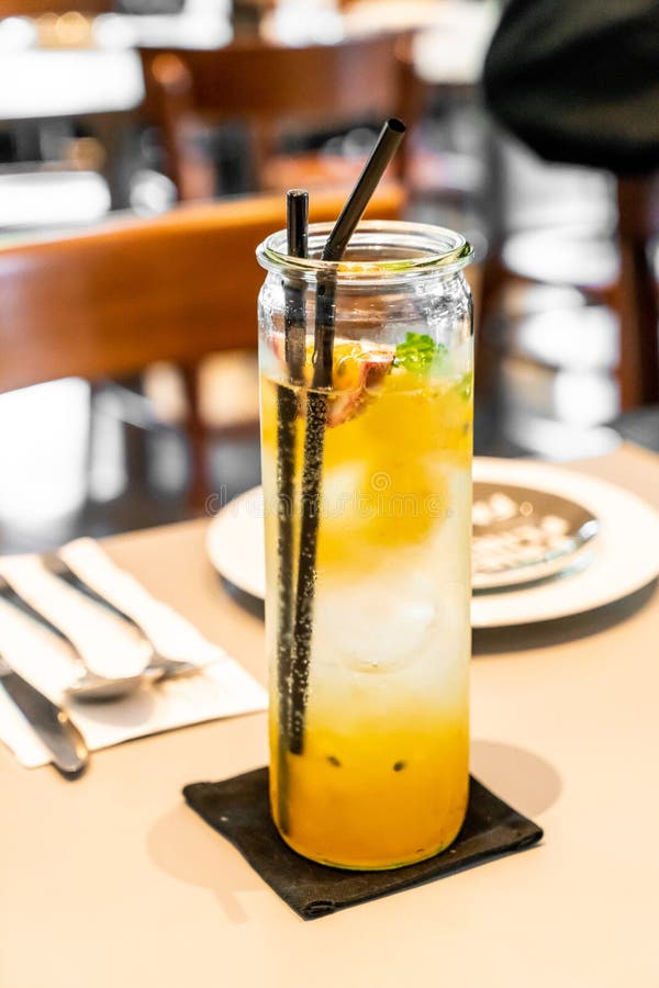 Passion fruit with soda stock image. Image of party - 149608243