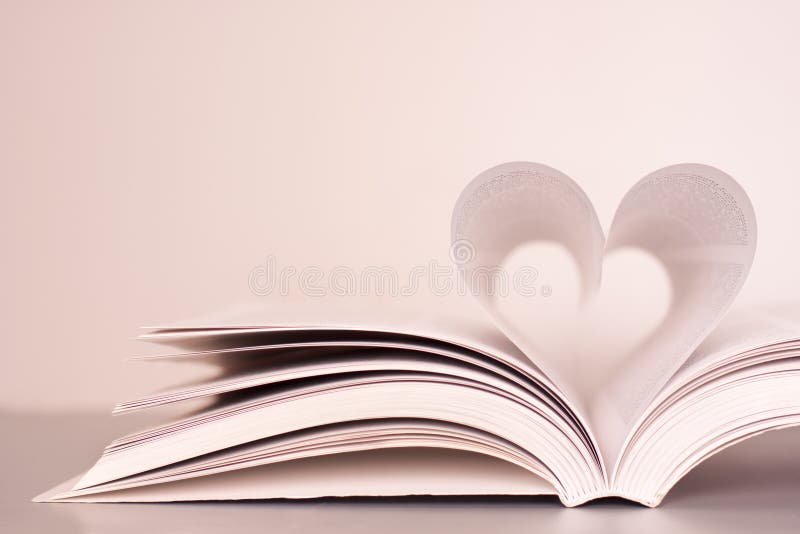 Open Book with Pages Forming Heart Shape . Stock Photo - Image of ...