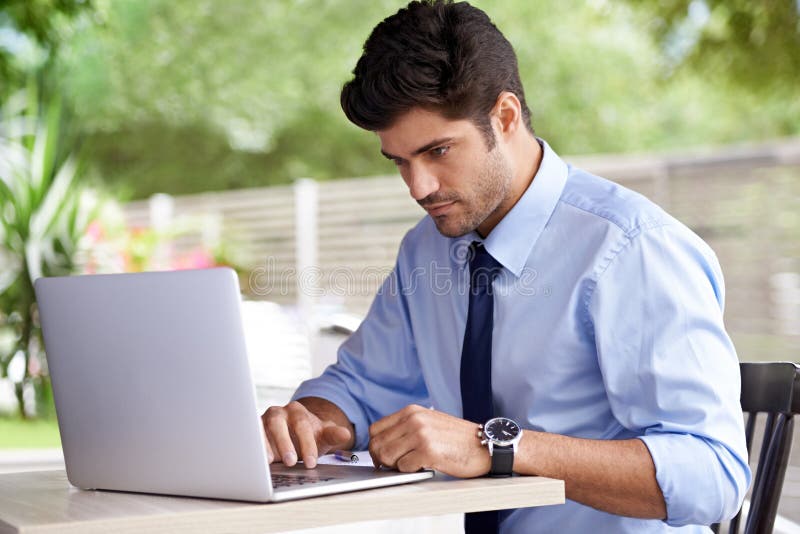 Passionate about His Work. a Handsome Young Businessman Working on His ...