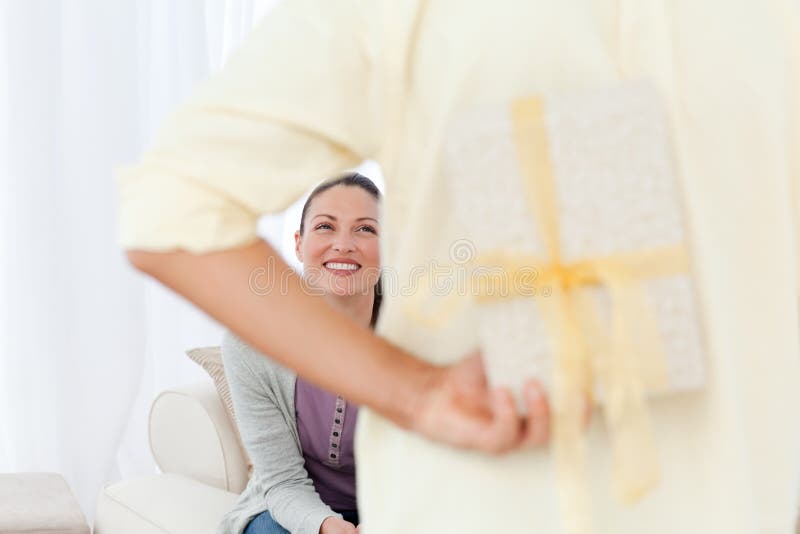 Passionate Man Hiding a Gift Behind His Back Stock Photo - Image of ...
