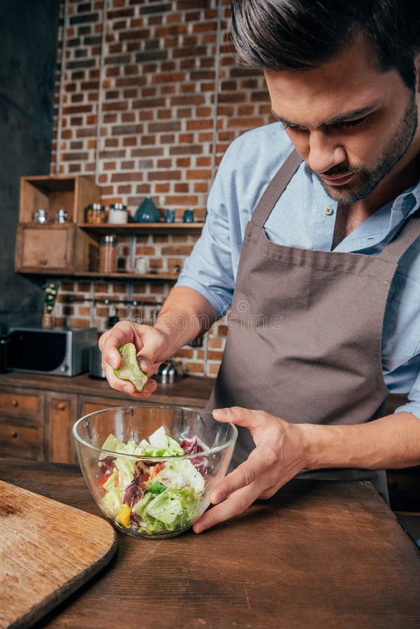 Passionated Young Man Making Stock Photo - Image of charming, cooking ...