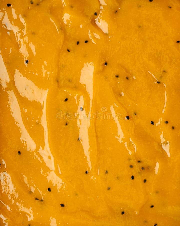 Passionfruit, Mango Jam Texture with Pulp in a Close Up on the Surface ...
