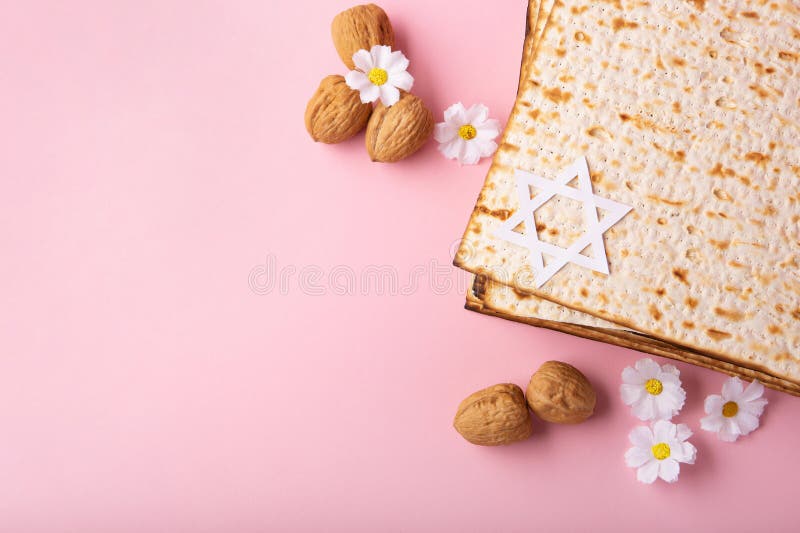 Passover Greeting Card With Matzah Nuts And Spring Flowers On Pink Background Stock Image