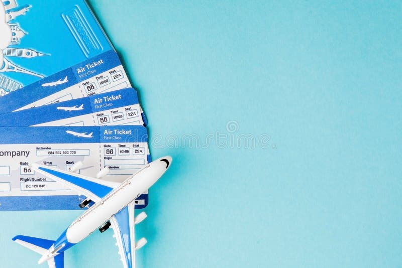 Passport Airplane And Air Ticket On A Blue Background Travel Concept