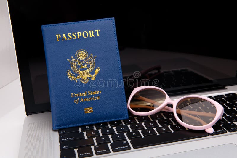 Passport Book with Laptop Computer on Table Stock Image - Image of ...
