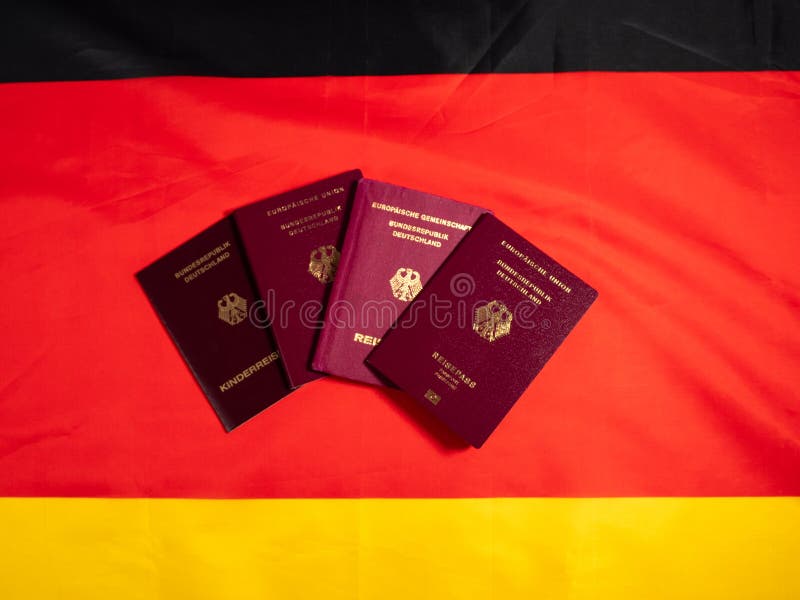 Passport of Citizen of Germany on Background of Flag of Germany. Stock ...