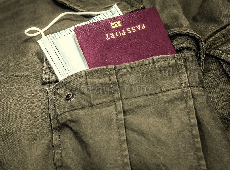 Passport and a Virus Protection Mask on a Pants Pocket Stock Photo ...