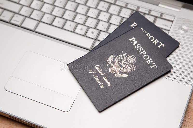 Passports on Laptop Keyboard Stock Image - Image of adventure, pass ...