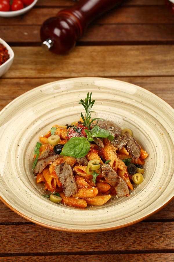 Pasta Arabbiata stock photo. Image of angry, bowl, tomatoes - 25793698