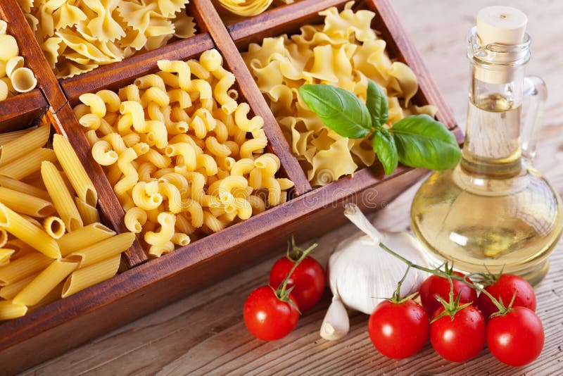 Pasta Assortment and Seasoning Ingredients Stock Image - Image of light ...