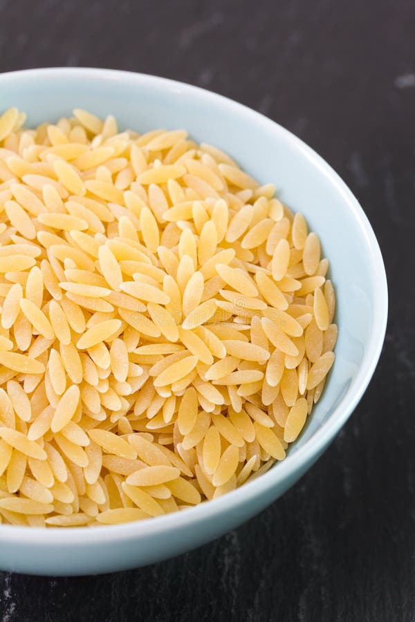 Pasta in blue dish stock photo. Image of eating, penne - 40894052