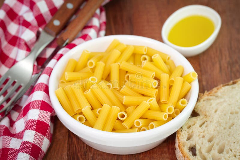 Pasta in bowl with bread stock photo. Image of mediterranean - 40051562