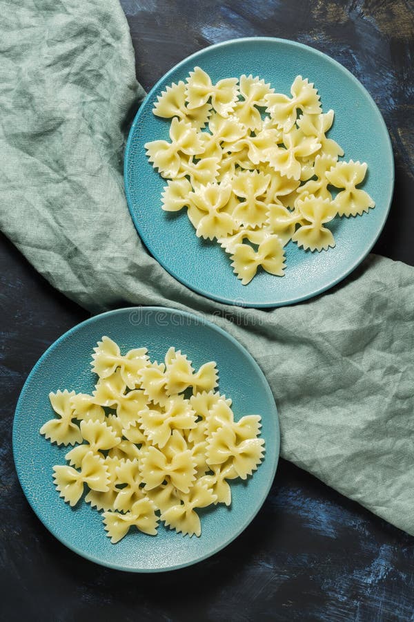 Pasta Bows on Blue Plates. View from Above Stock Photo - Image of meal ...
