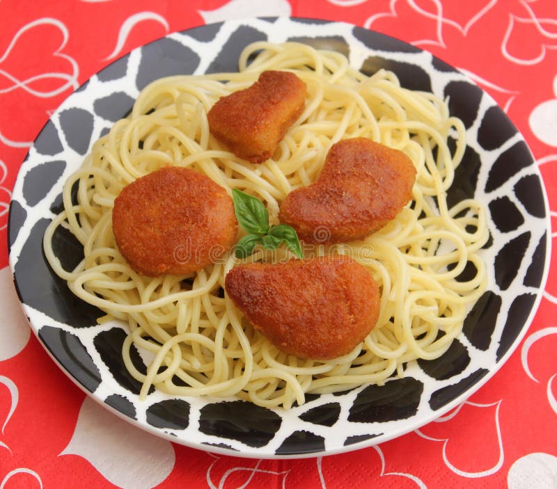 Pasta with chicken nuggets stock image. Image of chicken - 97086305