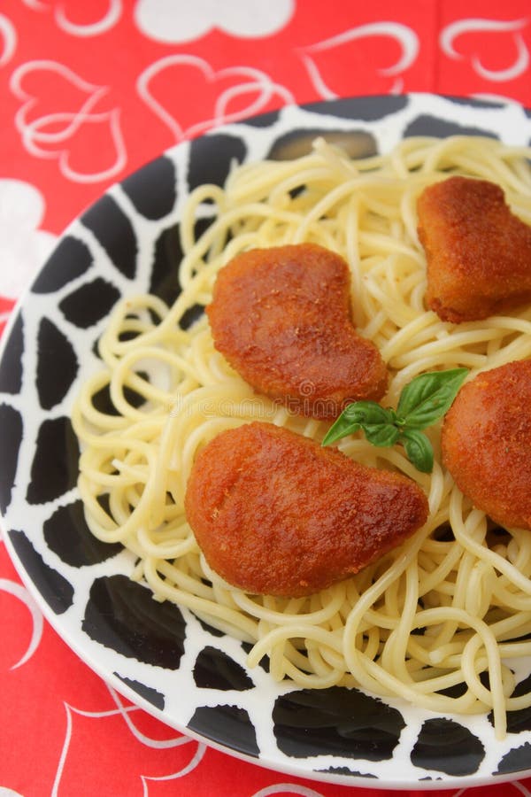 Pasta with chicken nuggets stock photo. Image of taglierini - 97086352
