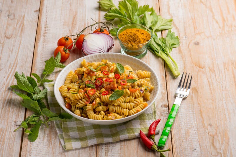 Pasta with Chicken Ragout and Curry Stock Photo - Image of cooked ...