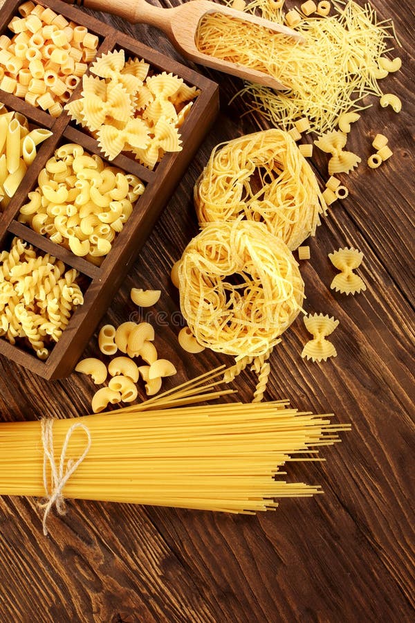 Pasta, Different Types of Cells in the Box, on Wooden Backgroun Stock ...