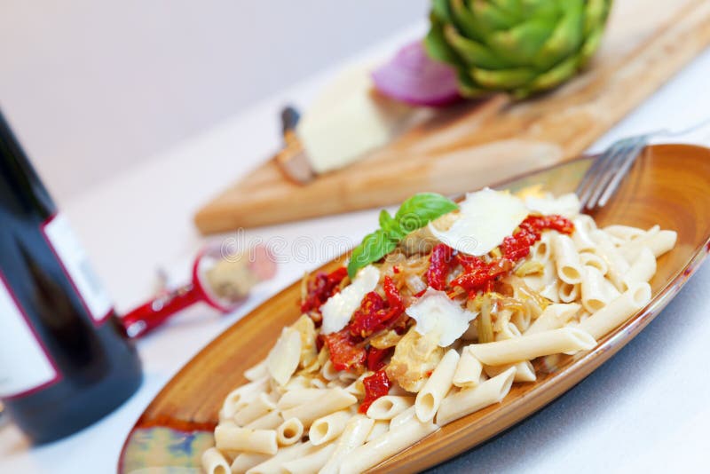 Pasta dish stock photo. Image of bottle, meal, plate - 21691510