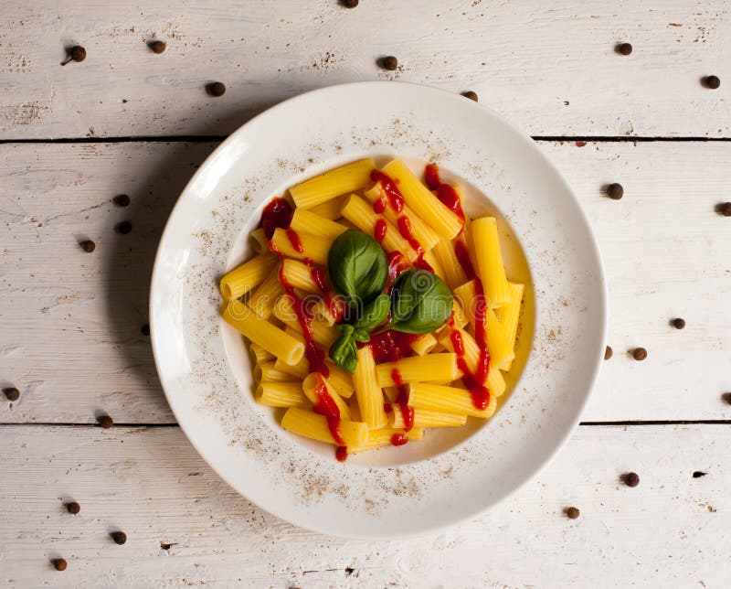 Pasta dish on the plate stock photo. Image of closeup - 80645176