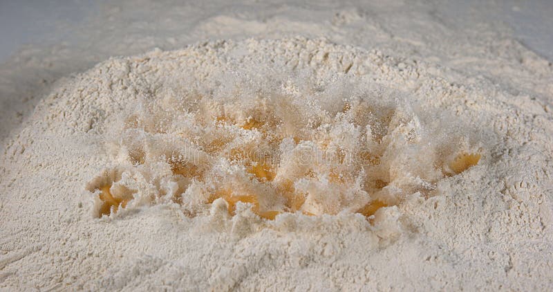 Pasta falling on flour stock image. Image of healthy - 289193341
