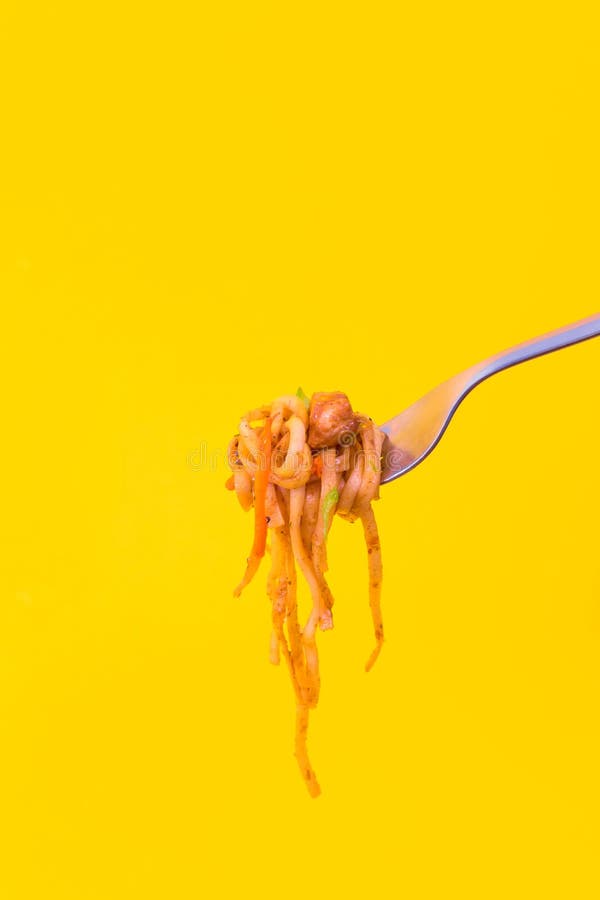 Pasta Falling from Fork on Yellow Background. Stock Image - Image of ...