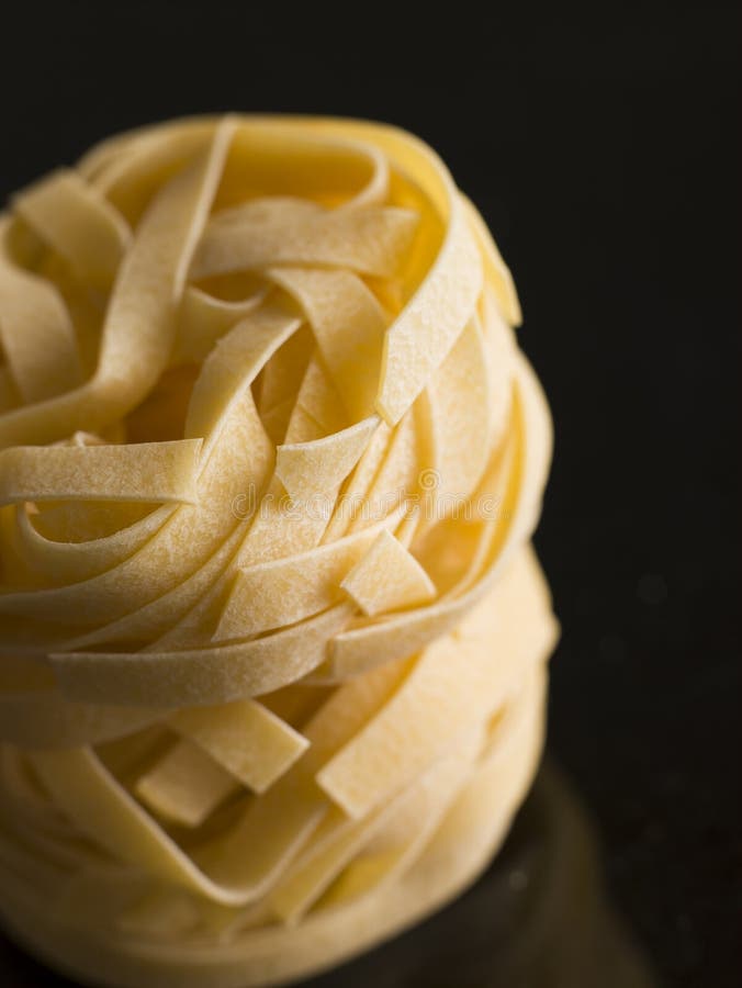 Fresh Egg Pasta Being Rolled in a Pasta Machine Stock Image - Image of ...