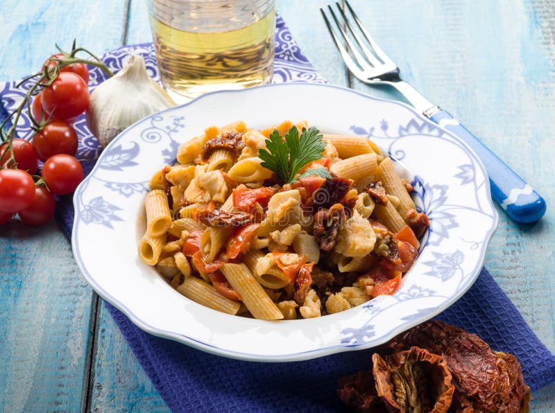 Pasta with fish ragout stock image. Image of basil, garnish - 108358087