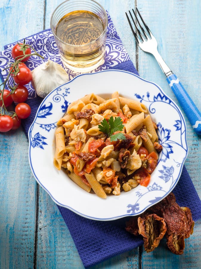 Pasta with fish ragout stock image. Image of recipe - 108358115