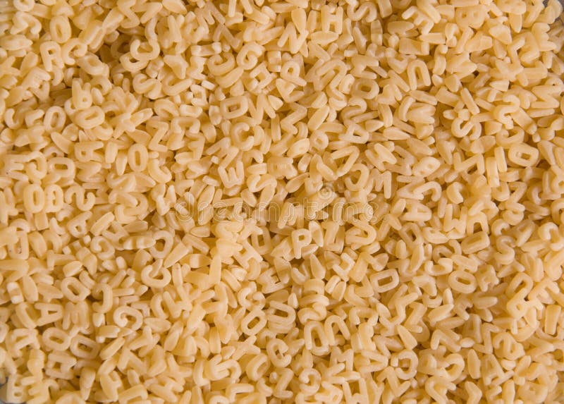 Pasta in the Form of Letters Stock Photo - Image of yellow, italian ...