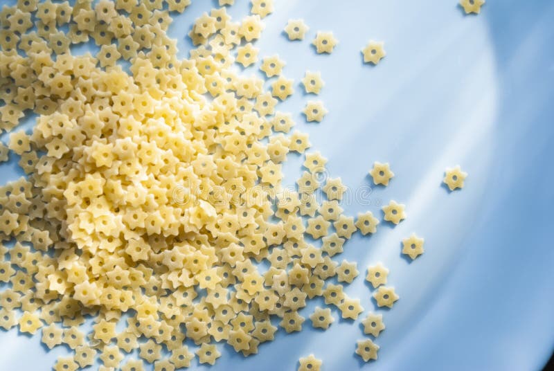 Pasta in the form of stars stock image. Image of collection - 199209425