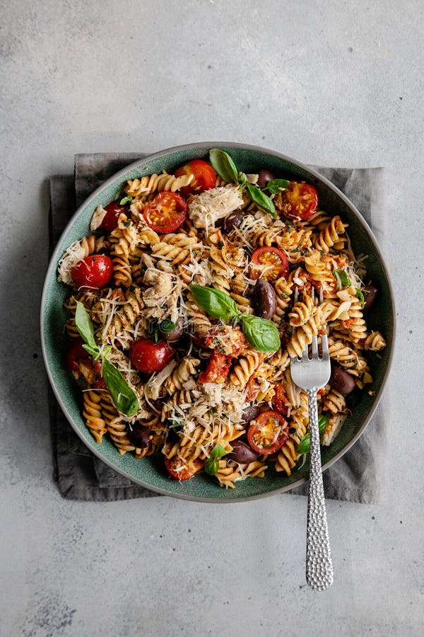 Pasta Fusilli with Vegetables in a Grey Plate on a Stone Table Stock ...