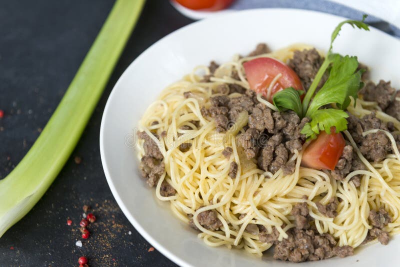 Pasta with Ground Beef and Tomato on a White Plate Stock Photo - Image ...