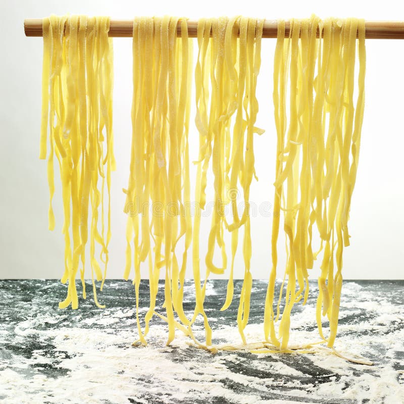 Pasta Hanging To Dry in the Kitchen Stock Photo - Image of cousine ...