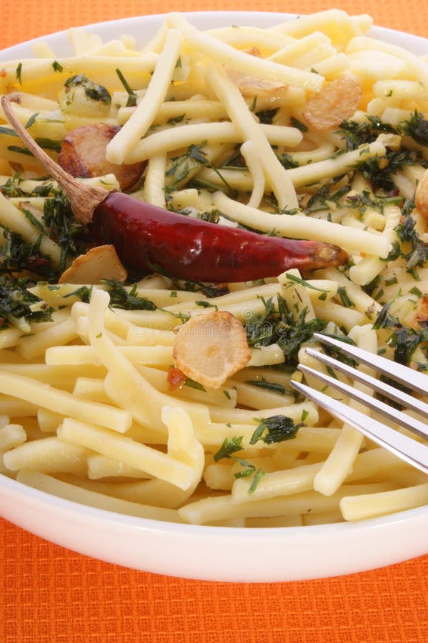 Pasta with Herbs and Garlic on a White Plate Stock Image - Image of ...