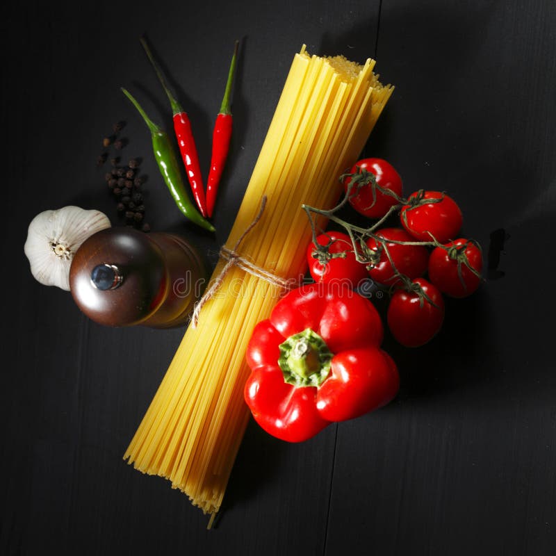 Pasta Ingredients on Black Table Stock Photo - Image of paprika, italy ...