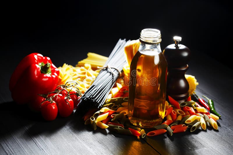 Pasta Ingredients on Black Table Stock Image - Image of closeup, life ...