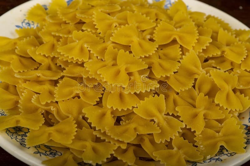 Pasta Made of Durum Wheat in a Plate Stock Photo - Image of dark, cook ...