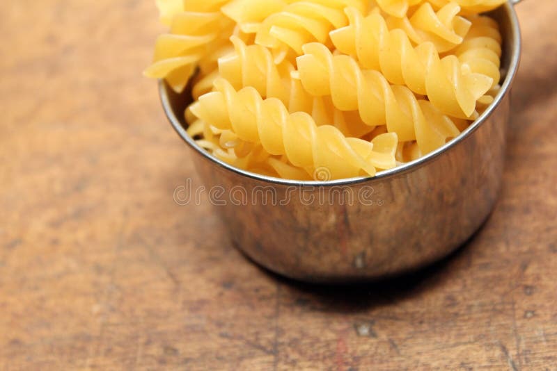 Pasta in measuring cup stock image. Image of chef, noodles - 37724195