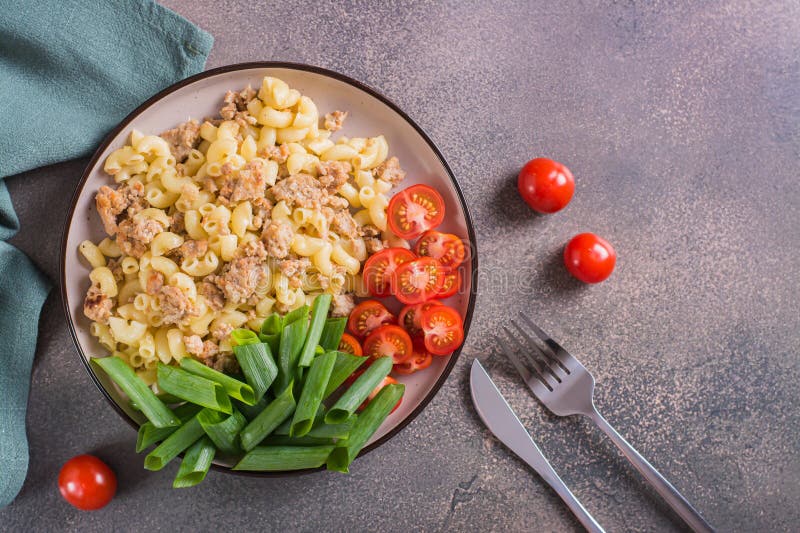 Pasta with Minced Meat, Tomatoes and Green Onions on a Plate on the ...