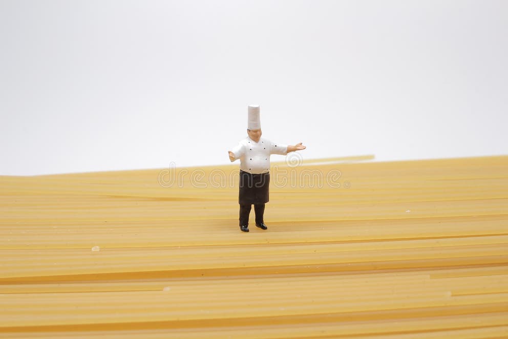 The Pasta and a Mini Chef Figure Stock Image - Image of bunch, cook ...