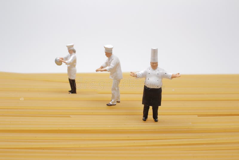 The Pasta and a Mini Chef Figure Stock Photo - Image of bunch, long ...