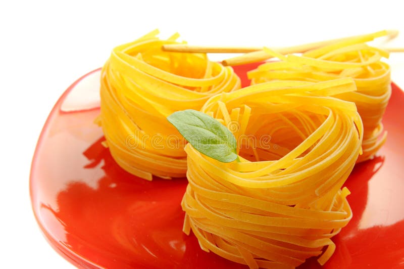 Pasta nests on a dish stock photo. Image of heap, kitchen - 23120422