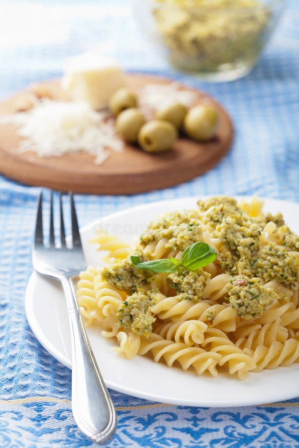 Pasta with olive tapenade stock photo. Image of green - 34415384